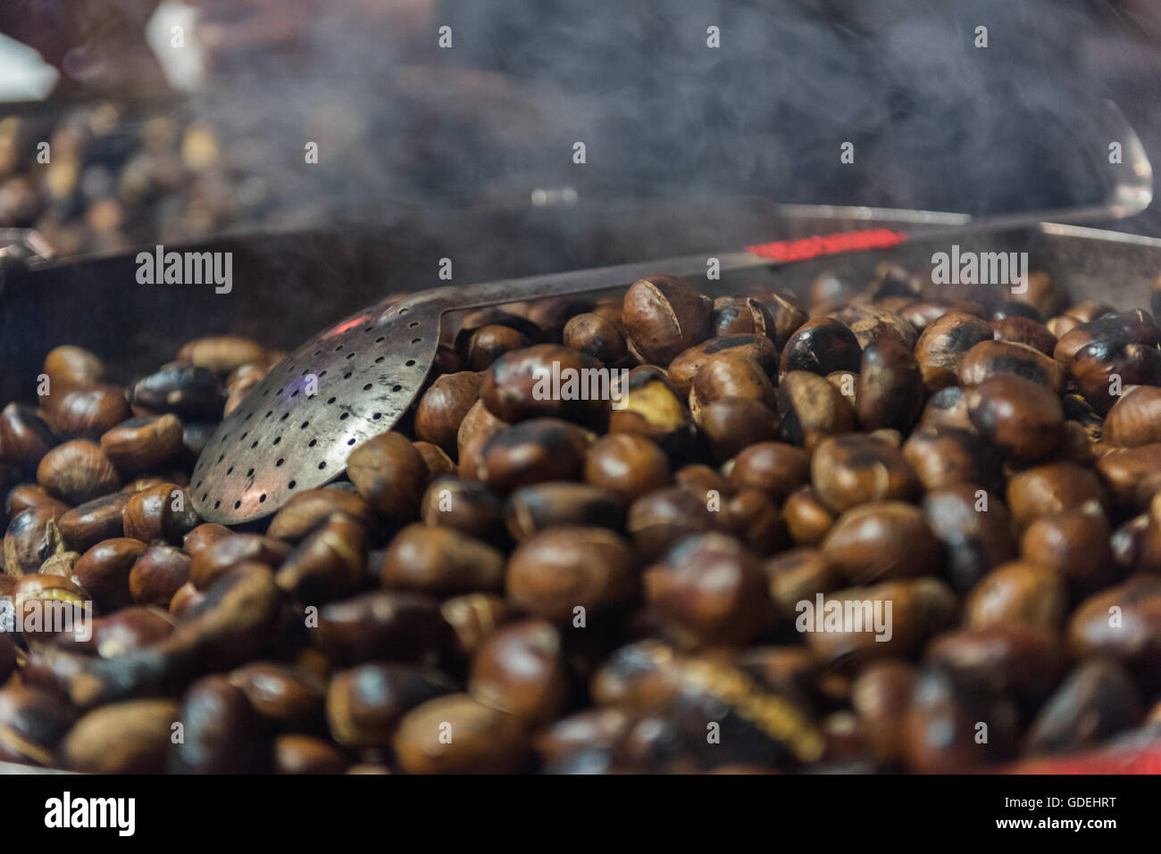 Roasted chestnuts ready to eat hi-res stock photography and images - Alamy