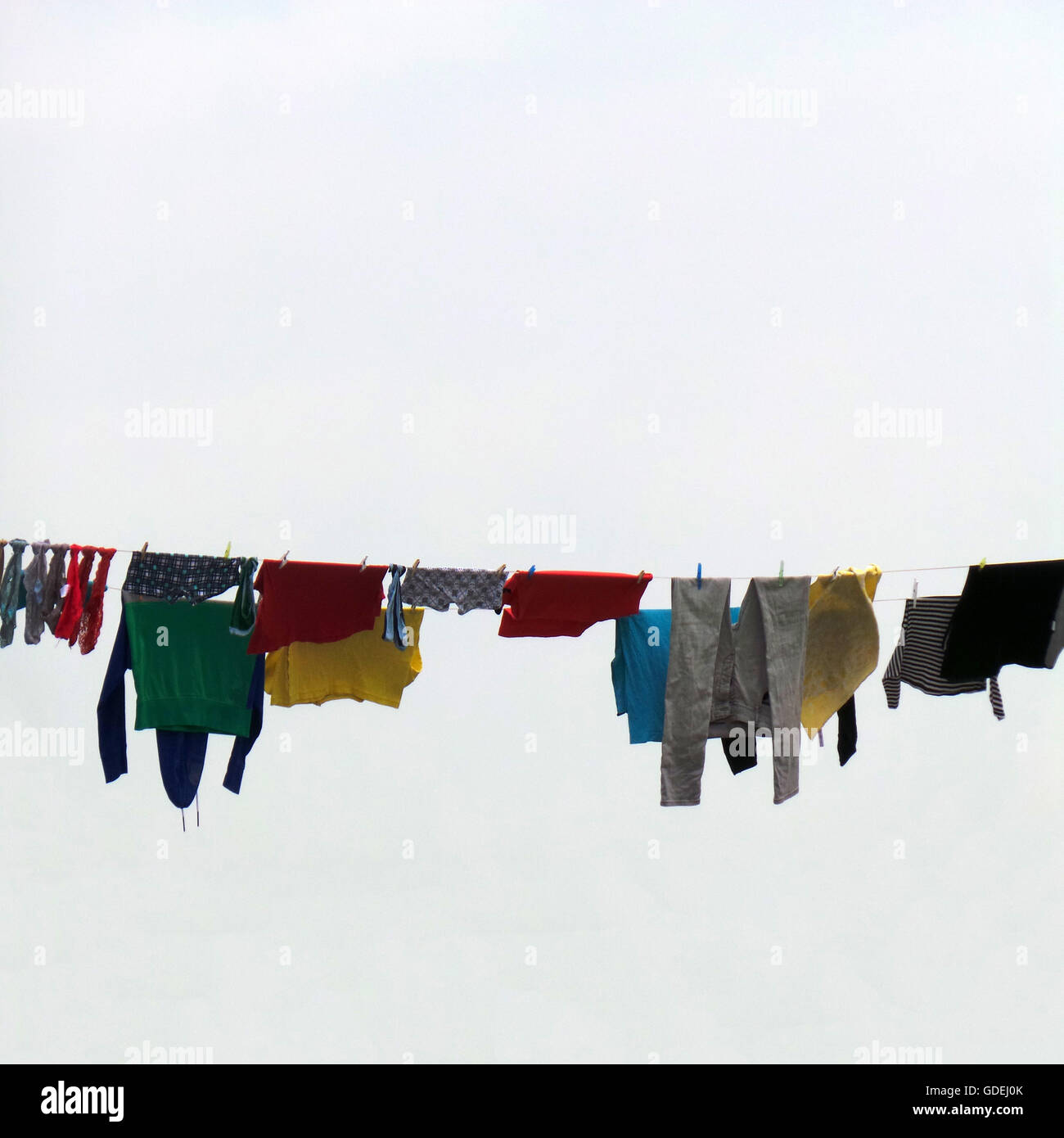 Clothes drying in the wind on a clothes line hi-res stock photography ...