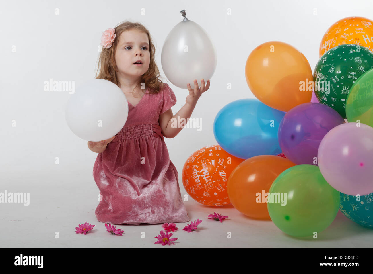 Girl sitting balloons hi-res stock photography and images - Alamy