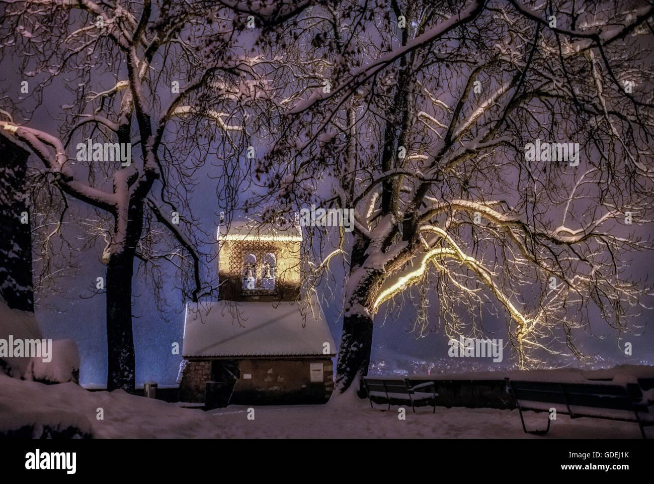 Snow covered church at night Stock Photo - Alamy