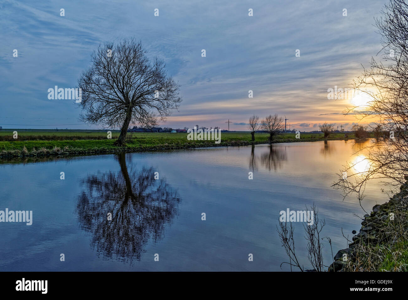 Ems river at sunset, Lower Saxony, Germany Stock Photo - Alamy