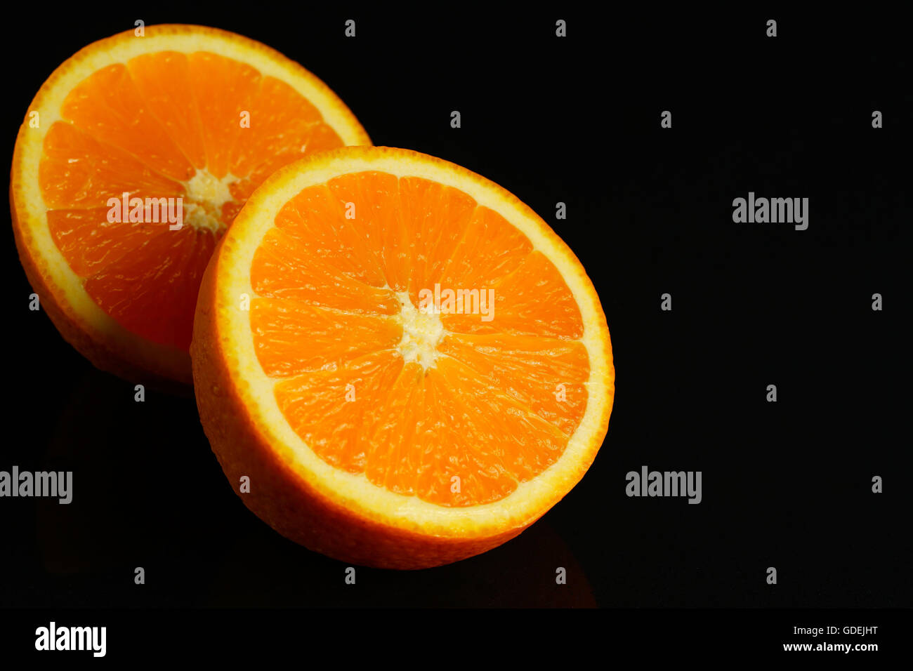 Orange cut in half hi-res stock photography and images - Alamy