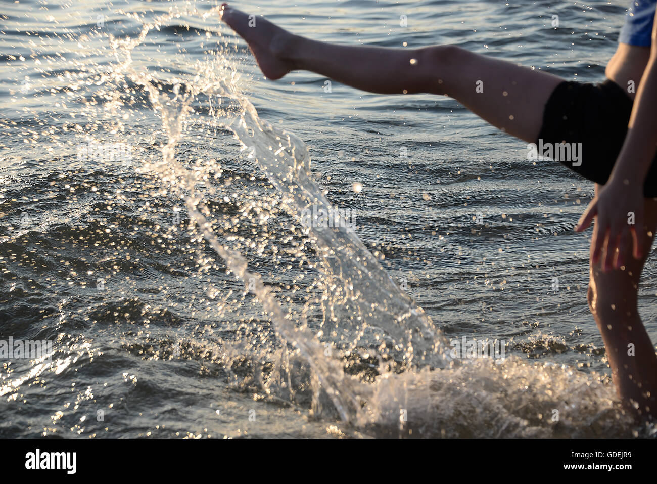 Children playing and splashing in water hi-res stock photography and ...