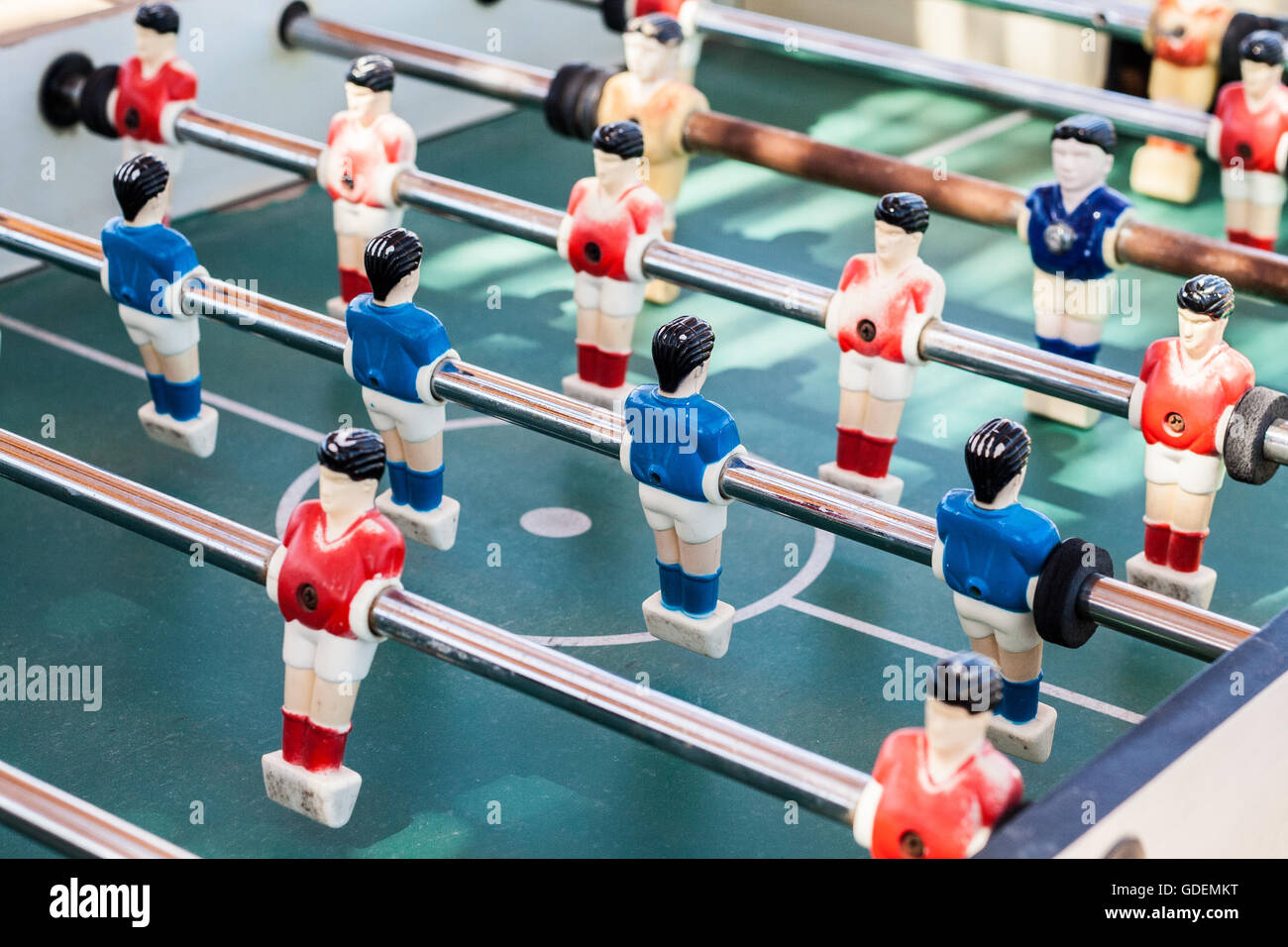 colored table football game with young players Stock Photo - Alamy