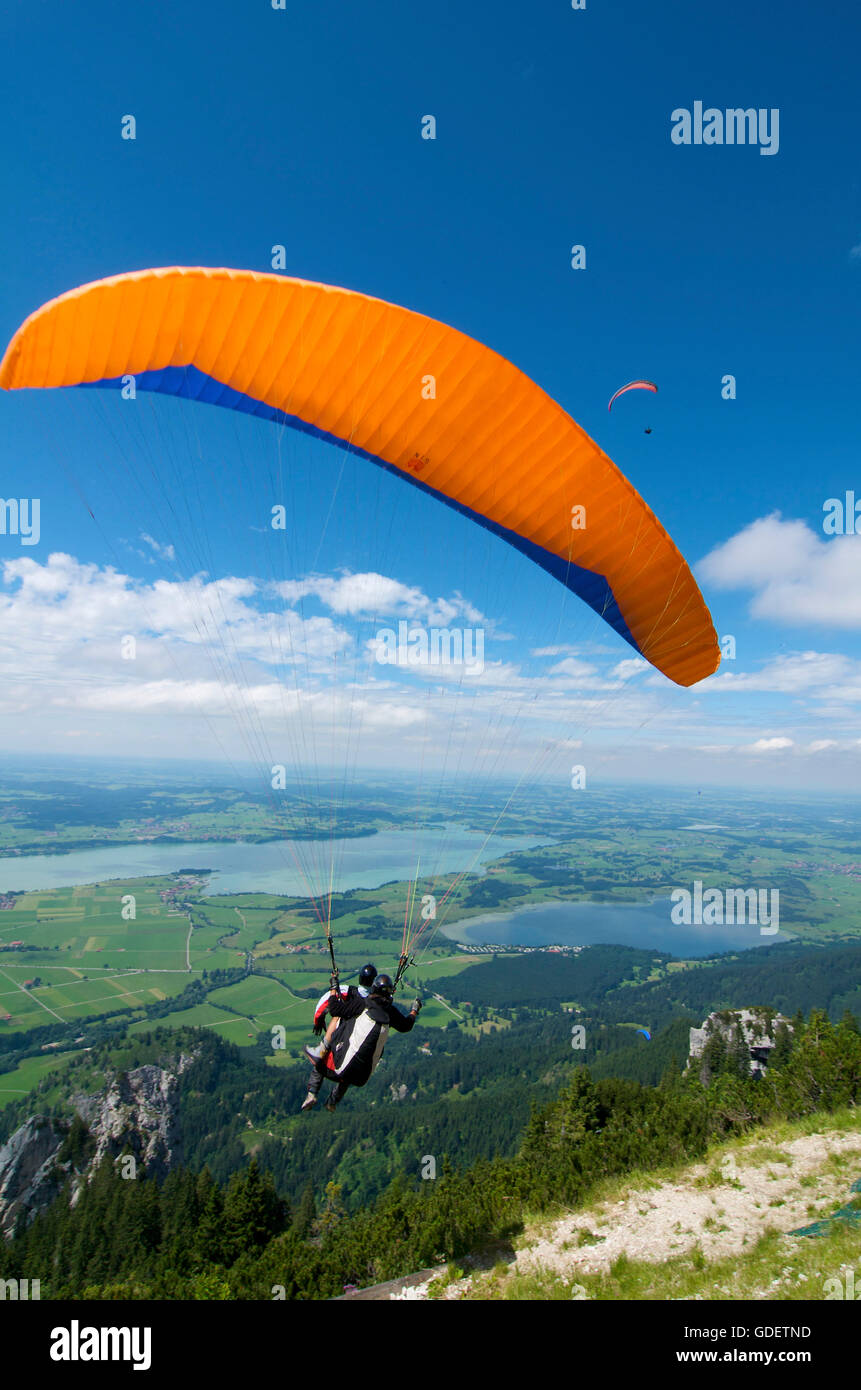Paragliding at Tegelberg, Fuessen, Allgaeu, Bavaria, Germany Stock ...