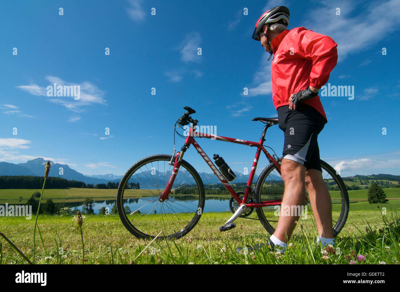 Biking at lake forggensee hi-res stock photography and images - Alamy