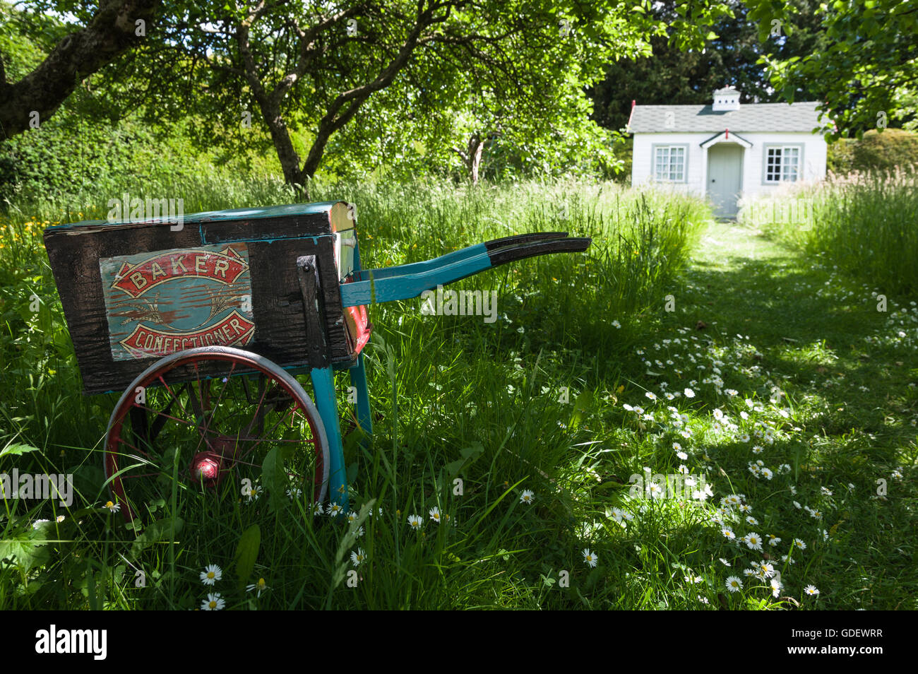 Toy push pull baker and confectioner cart with a play house in the ...