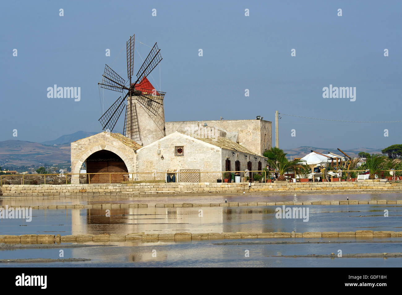 Windmill and saltworks near Trapani, Sicily, Italy Stock Photo - Alamy