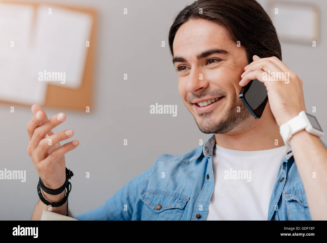 Pleasant delighted man talking hi-res stock photography and images - Alamy