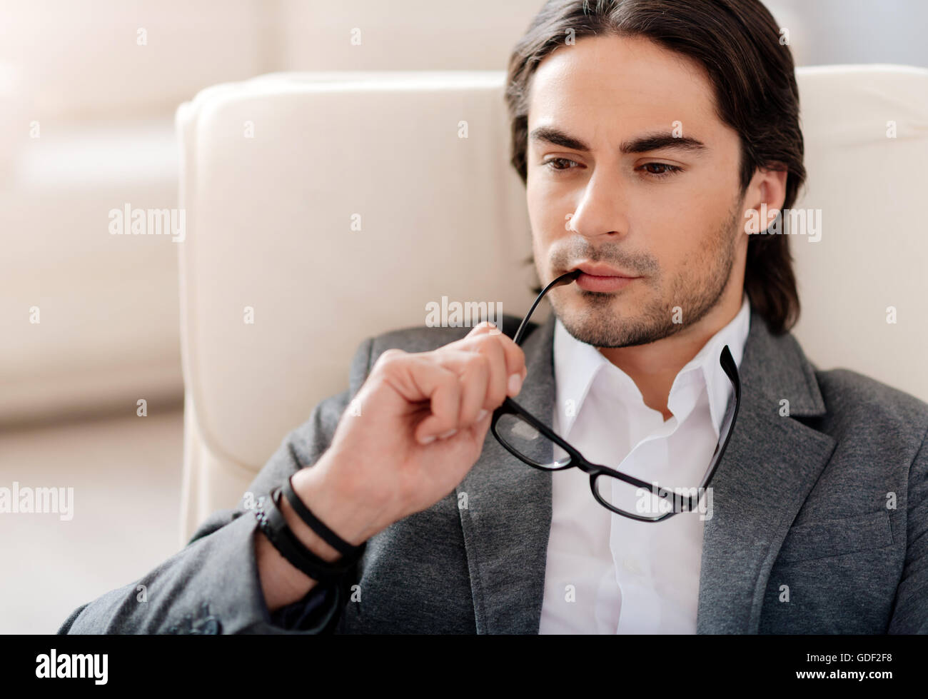 Serious man thinking Stock Photo - Alamy