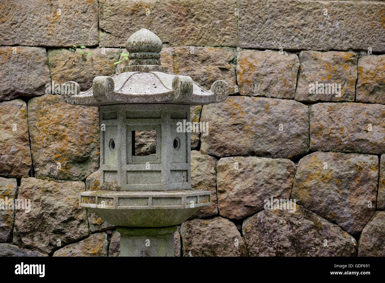 A stone lantern outside the Futarasan Shinto shrine at Nikko, Japan ...