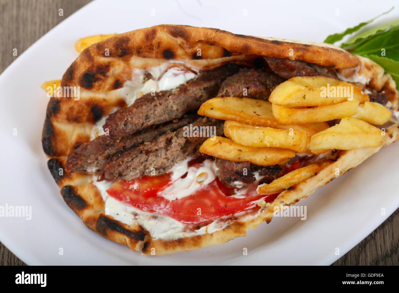 Gyros - tradition Greek cuisine - pork with pita, potato and sauce ...