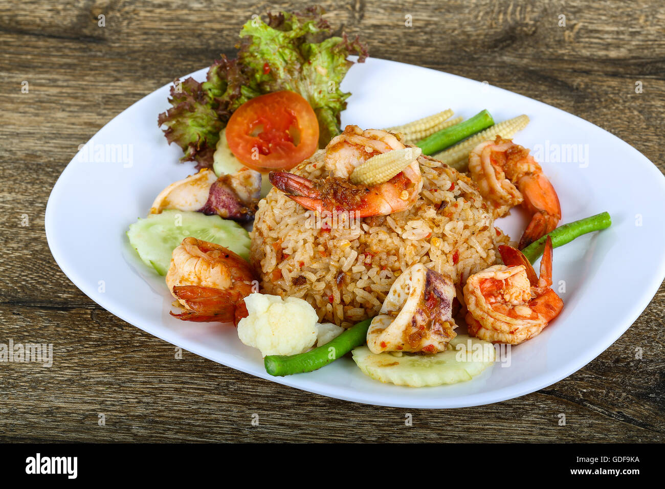 Asian style Fried rice with seafood, herbs and spices Stock Photo - Alamy