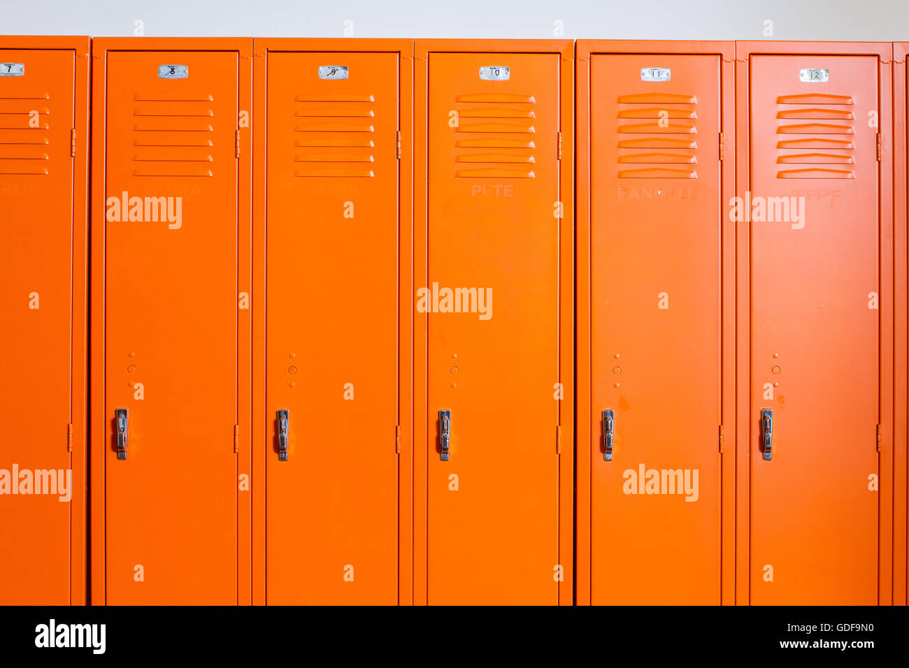 A close up of orange gym lockers Stock Photo - Alamy