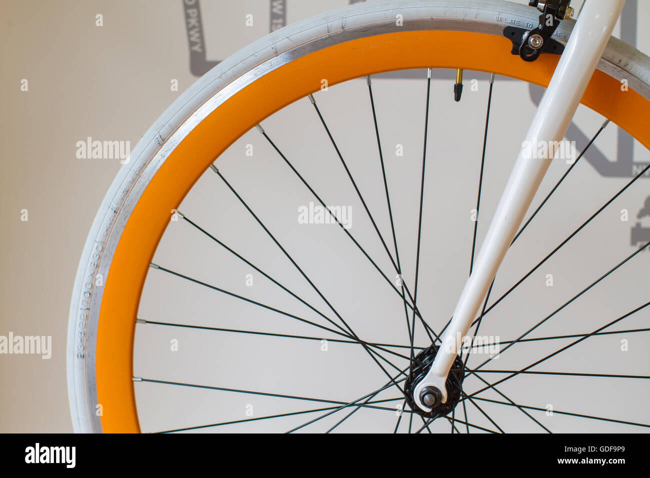 Close up of an orange bike tire Stock Photo - Alamy