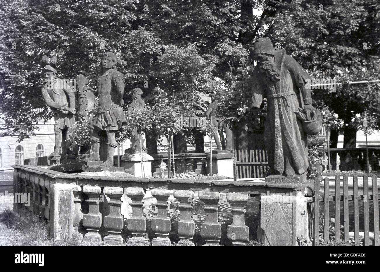 1930s, historical, various stone statues stand in the market square of ...