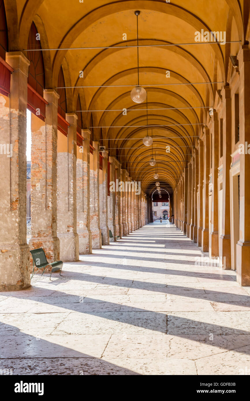 bench under the arches of a medieval porch Stock Photo - Alamy
