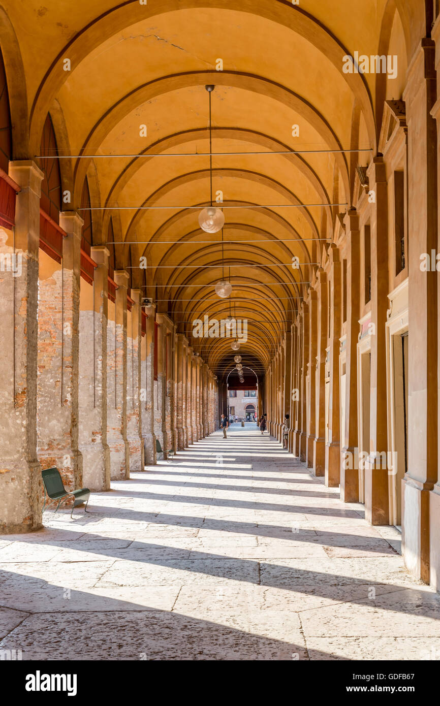 bench under the arches of a medieval porch Stock Photo - Alamy