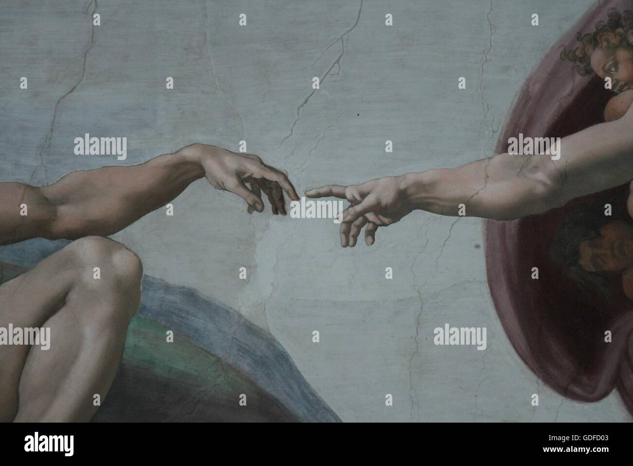 The famous Sistine Chapel fresco by Michelangelo showing the hand of ...