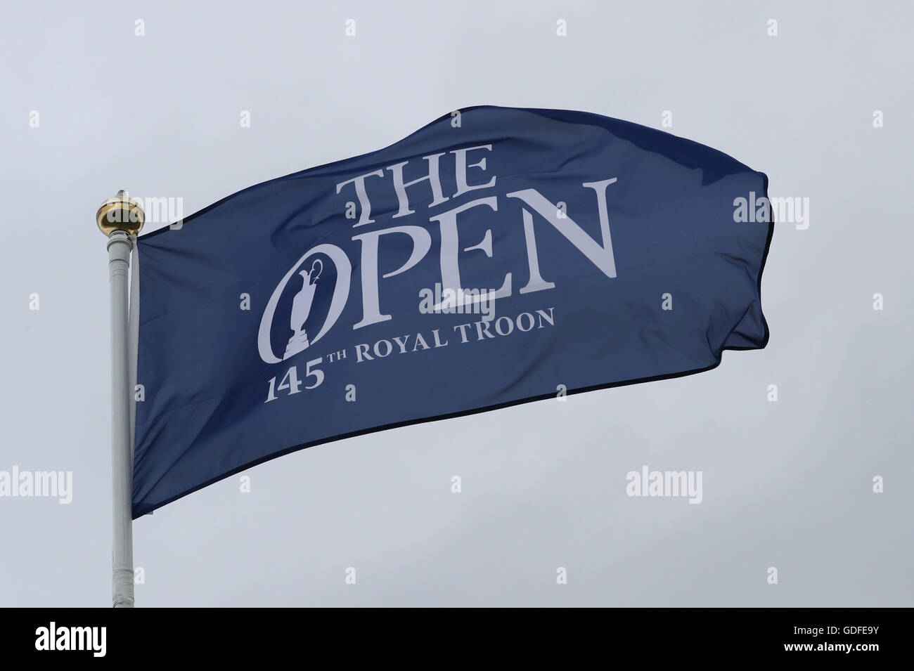 A 'The Open' flag flies in the wind during day three of The Open ...