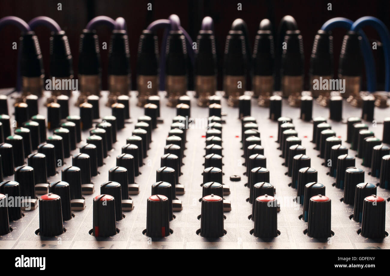 Knobs of a studio soundboard Stock Photo - Alamy
