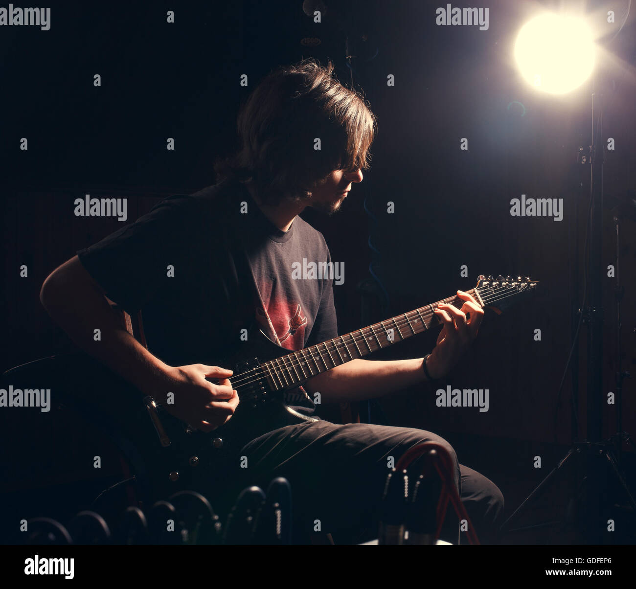 guy playing bass guitar Stock Photo - Alamy