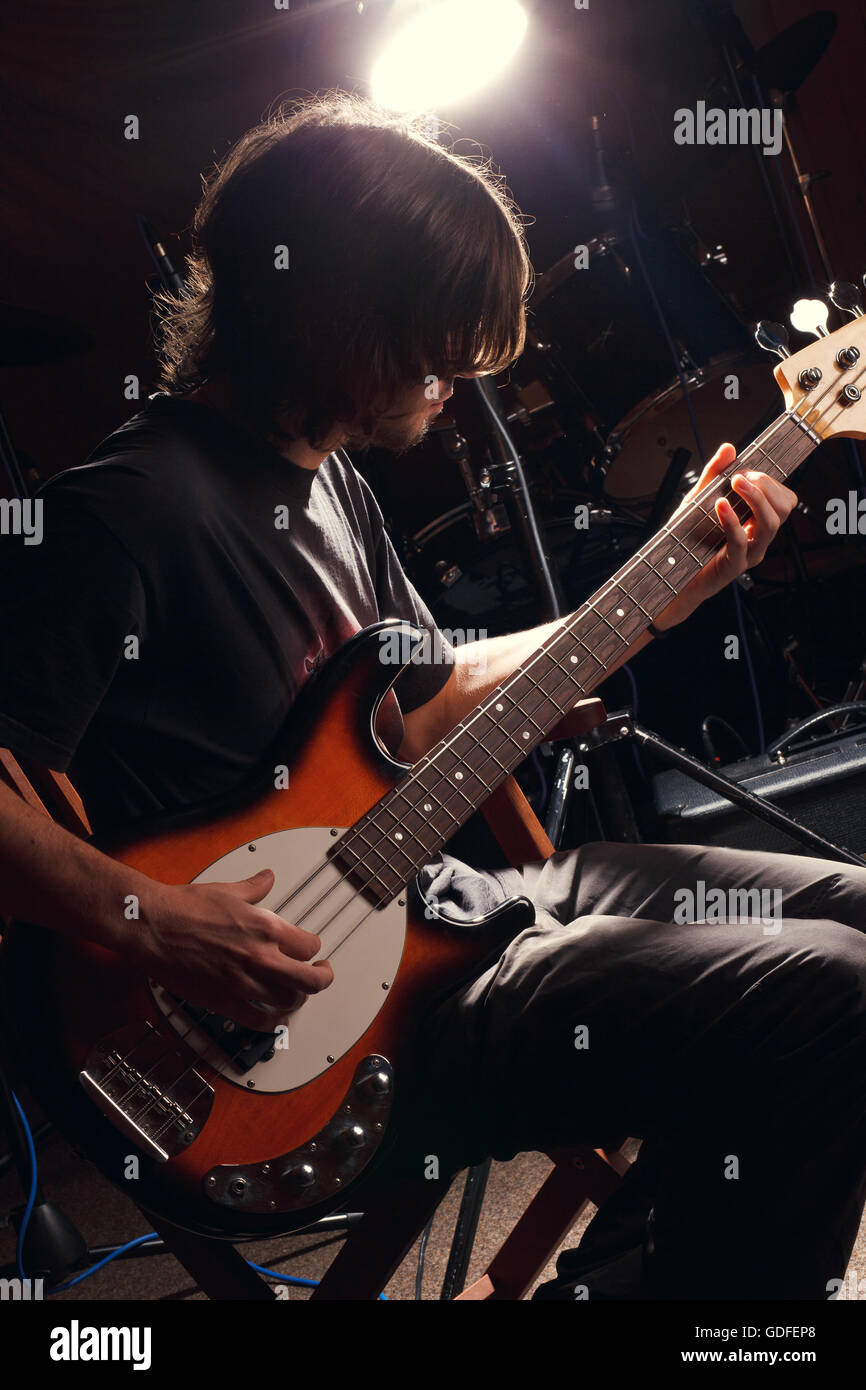 guy playing bass guitar Stock Photo - Alamy