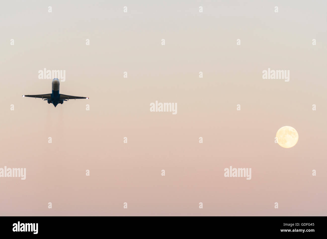 Plane and the moon hi-res stock photography and images - Alamy