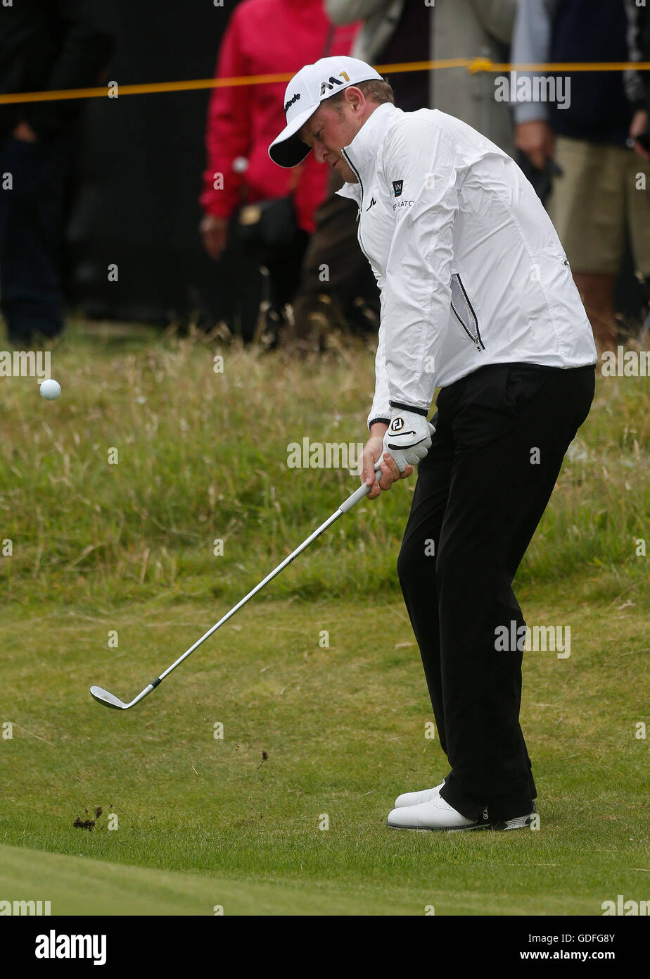 Wales' Jamie Donaldson chips onto the 4th during day three of The Open ...
