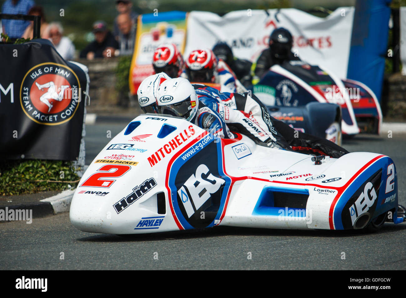 Ben & Tom Birchall round Castletown Corner during the Manx Gas Sidecar ...