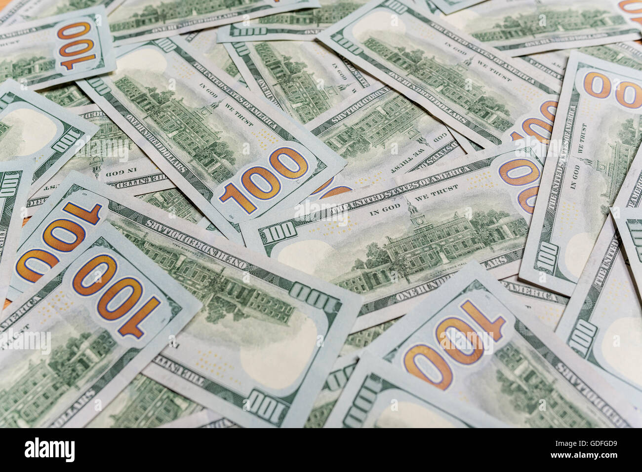 One hundred dollars background. Background paved with hundred dollar bills Stock Photo - Alamy