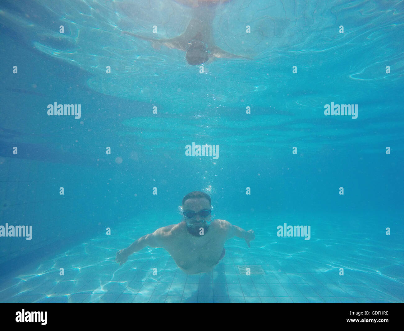 Man beard underwater swimming pool hi-res stock photography and images ...