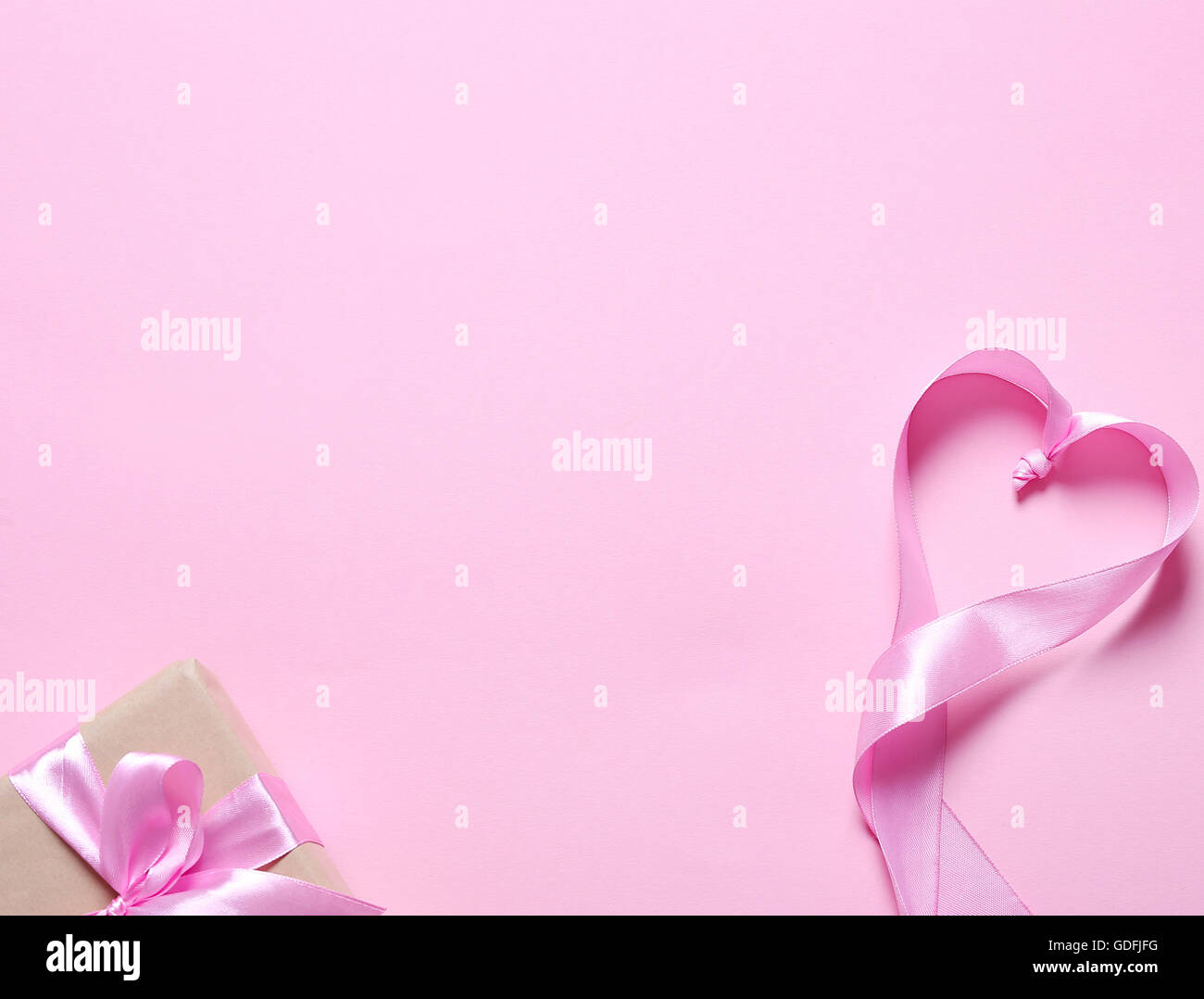 Gift with pink ribbon Stock Photo - Alamy