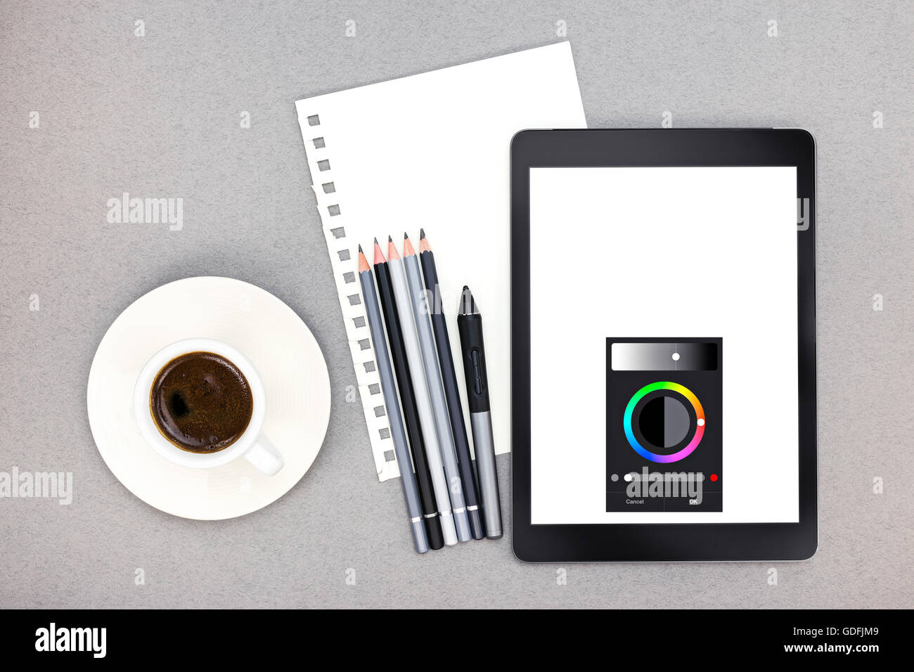 office workplace with paper sheet, pencils, tablet with stylus and ...