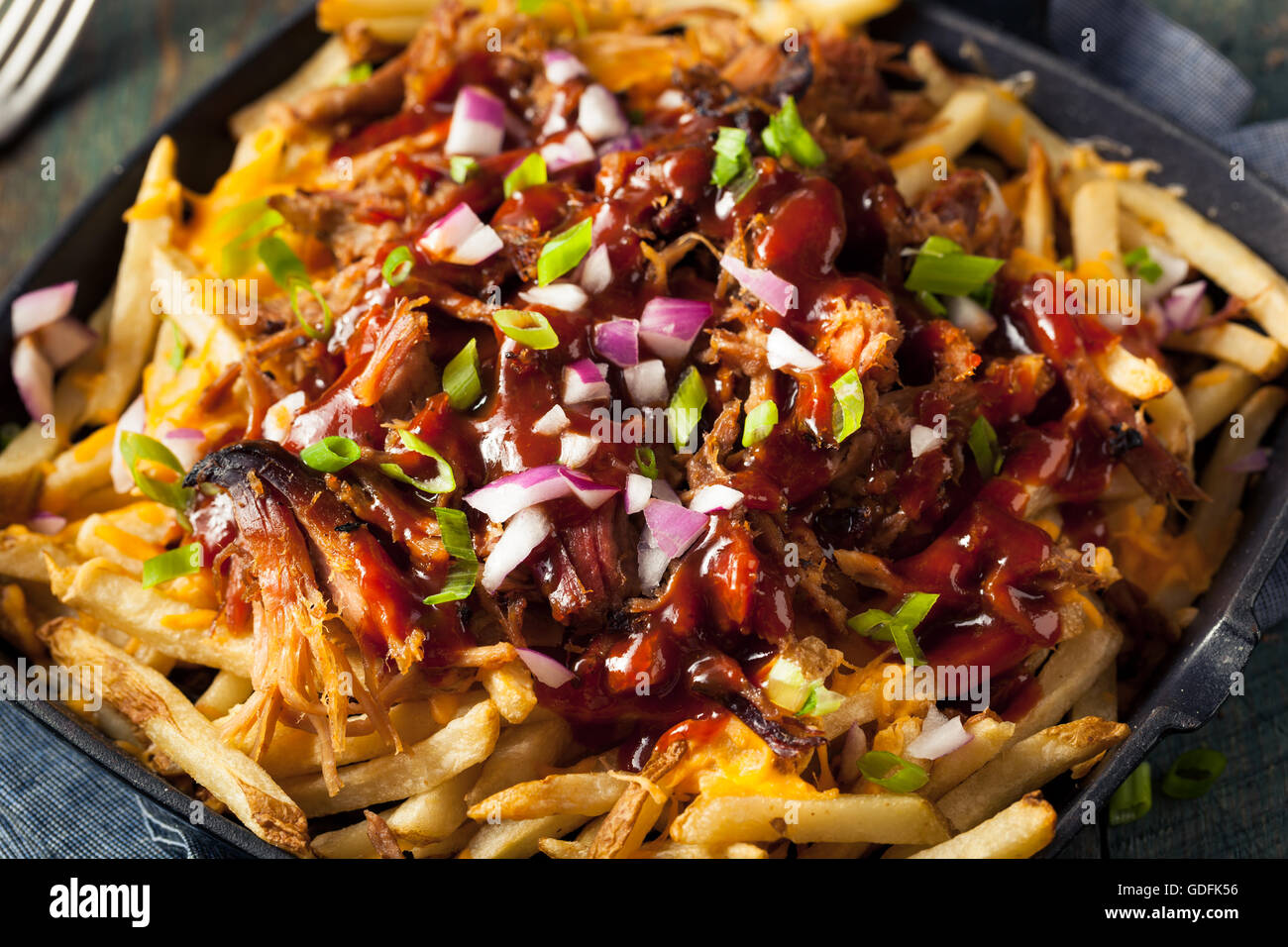 Homemade BBQ Pulled Pork French Fries with Sauce Stock Photo - Alamy