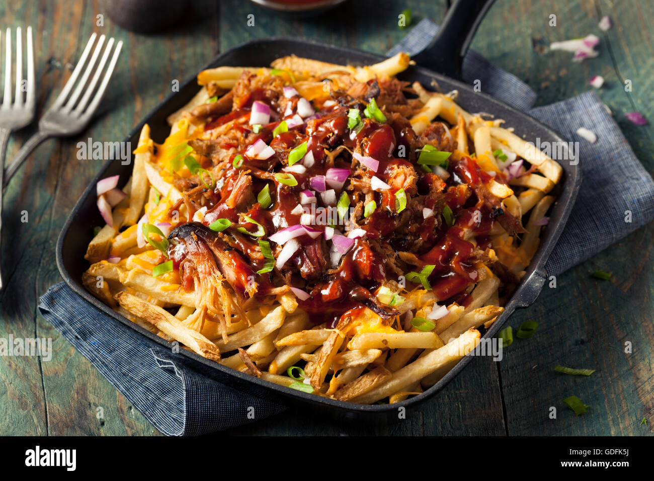 Homemade BBQ Pulled Pork French Fries with Sauce Stock Photo - Alamy