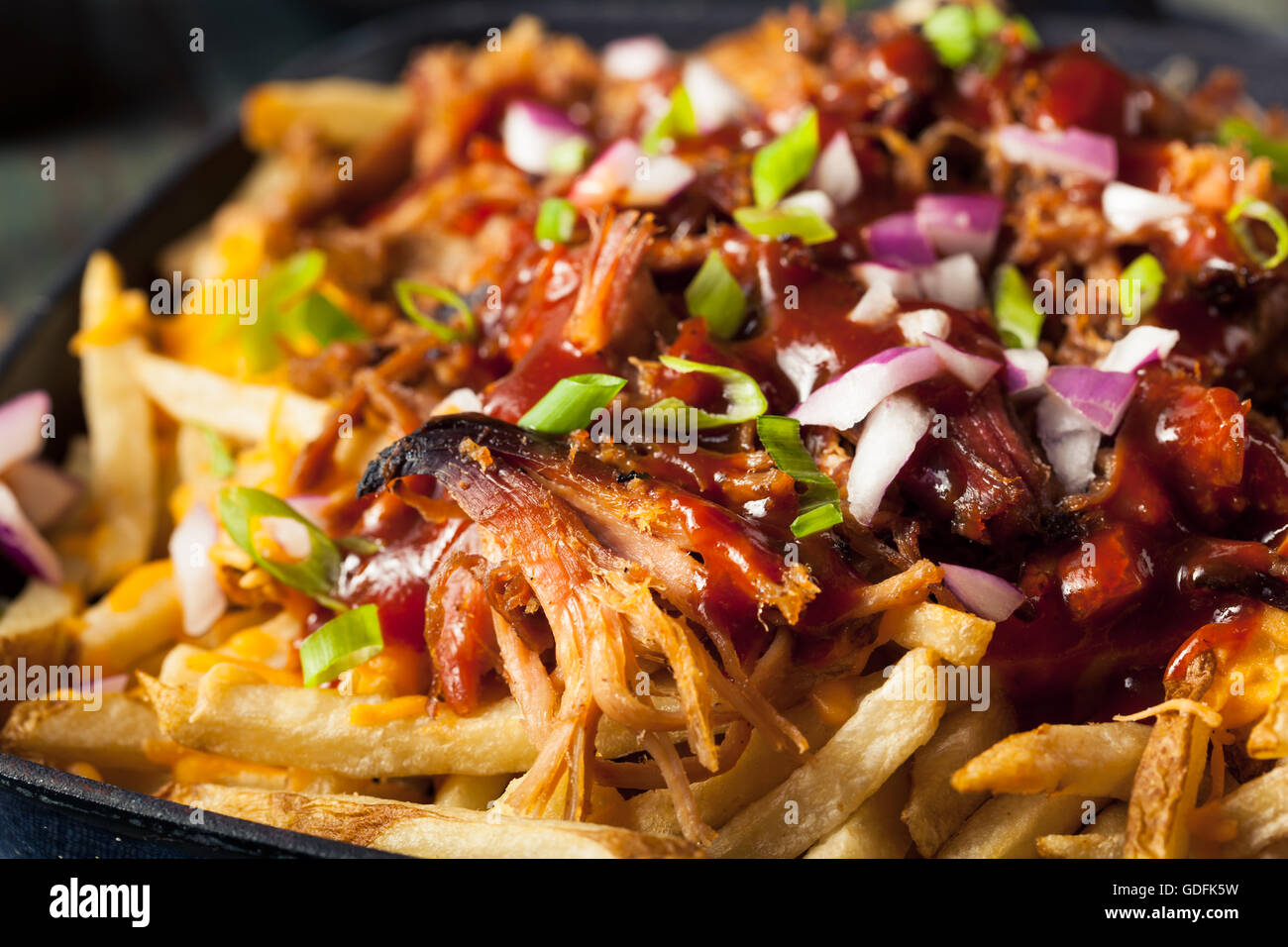 Homemade BBQ Pulled Pork French Fries with Sauce Stock Photo - Alamy