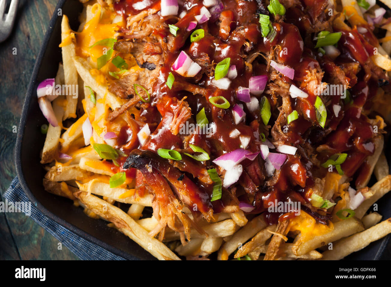 Homemade BBQ Pulled Pork French Fries with Sauce Stock Photo - Alamy