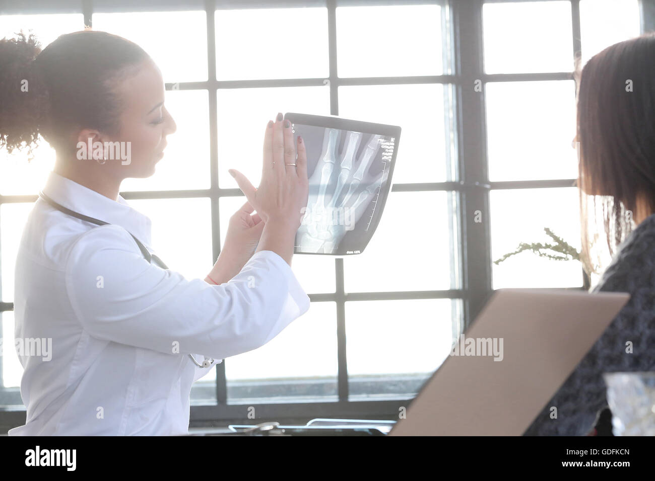 Attractive doctor and patient african hi-res stock photography and ...
