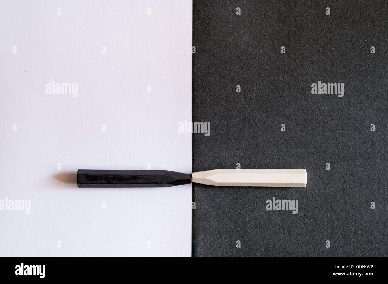 black and white crayons on alternate background of the same color, to ...