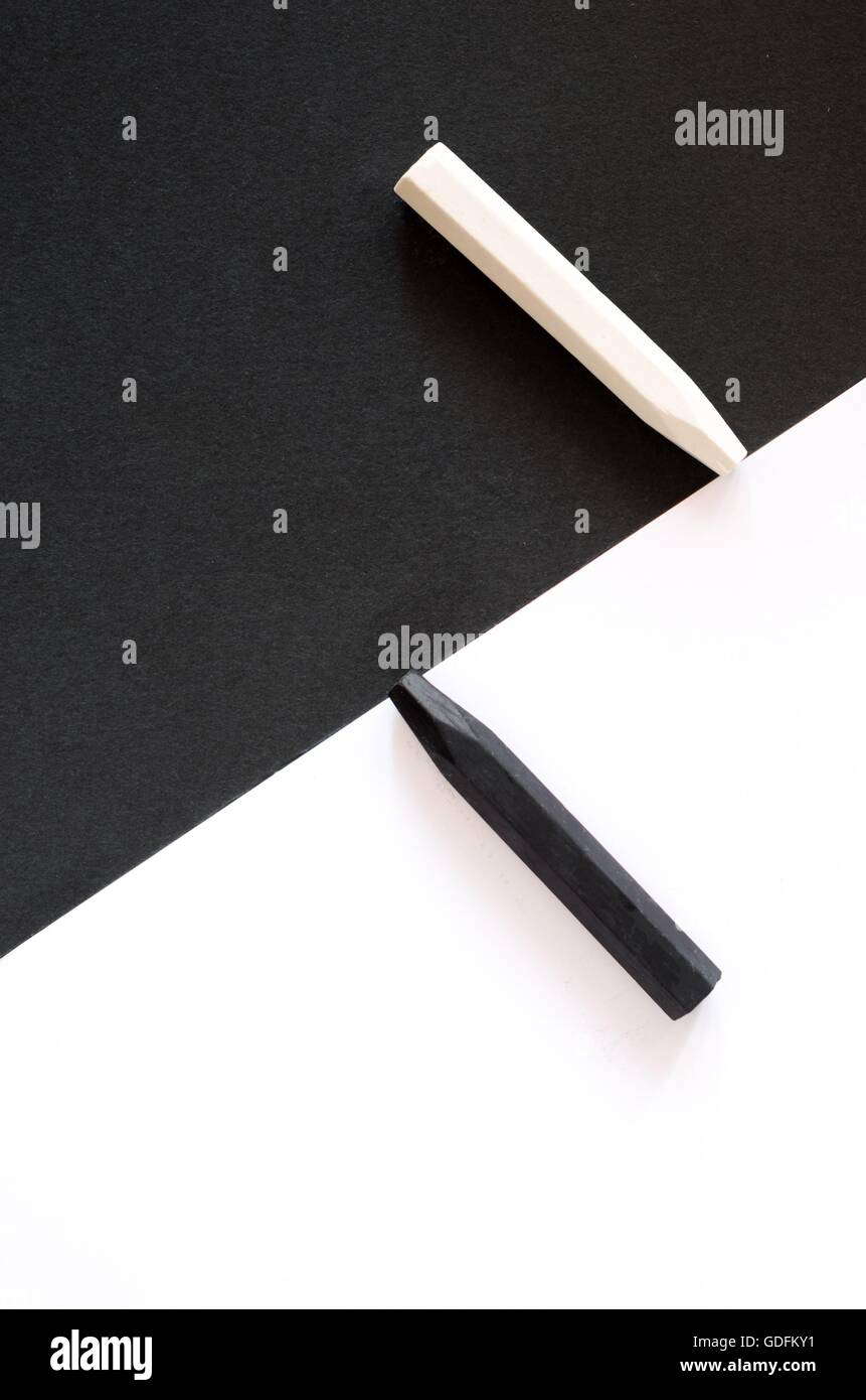 black and white crayons on alternate background of the same color, to ...