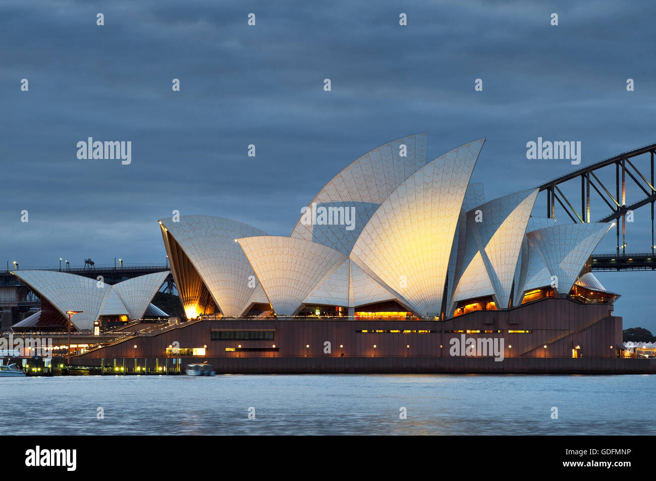 Sydney Opera House illuminated in the evening Stock Photo - Alamy
