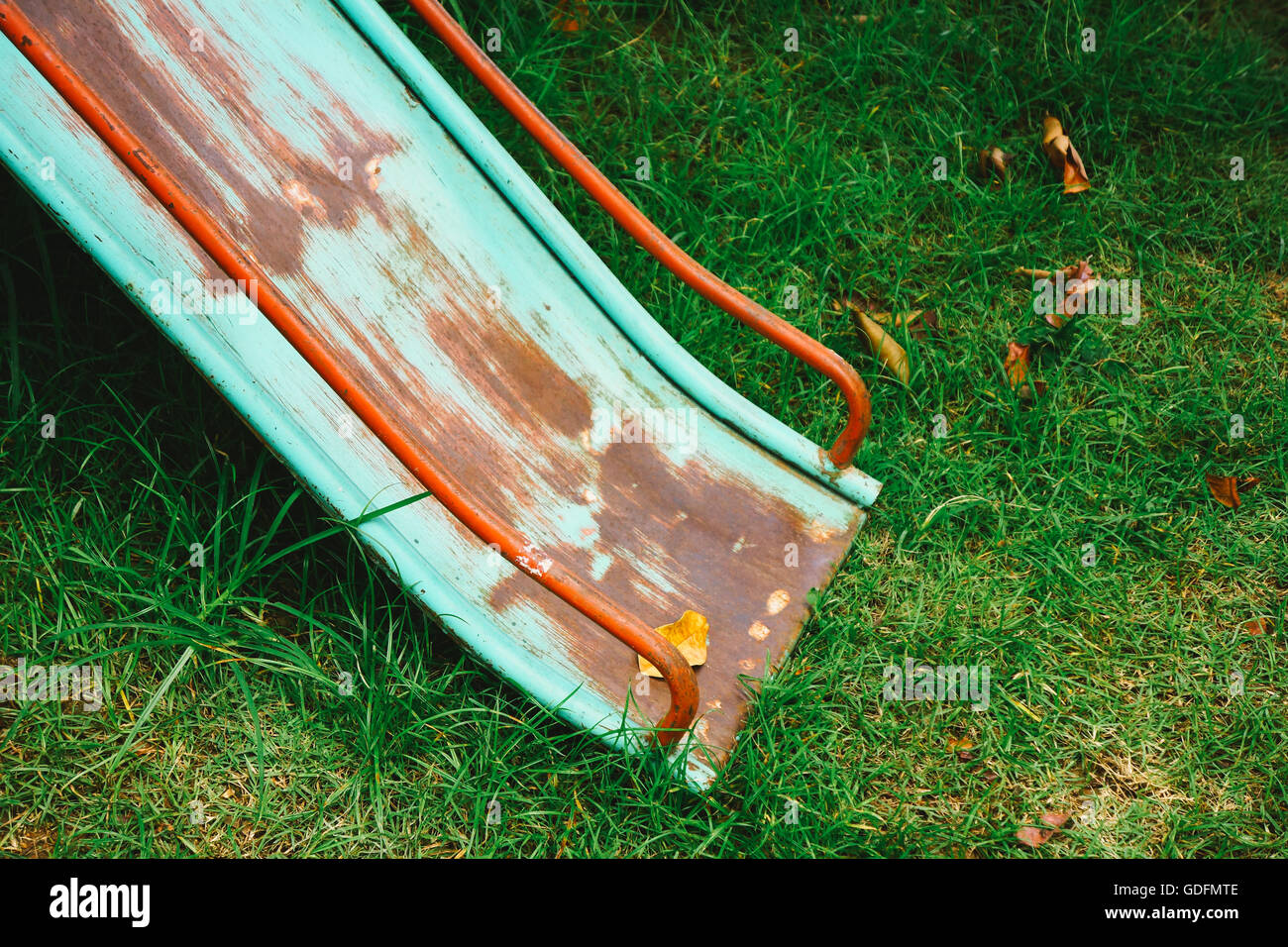 The old slider of playground Stock Photo - Alamy
