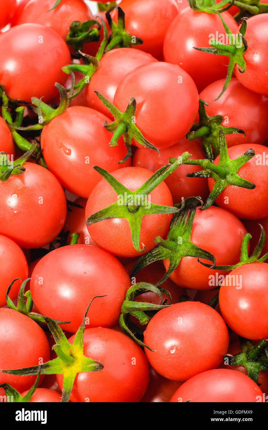 food background of fresh red cherry tomatoes Stock Photo - Alamy