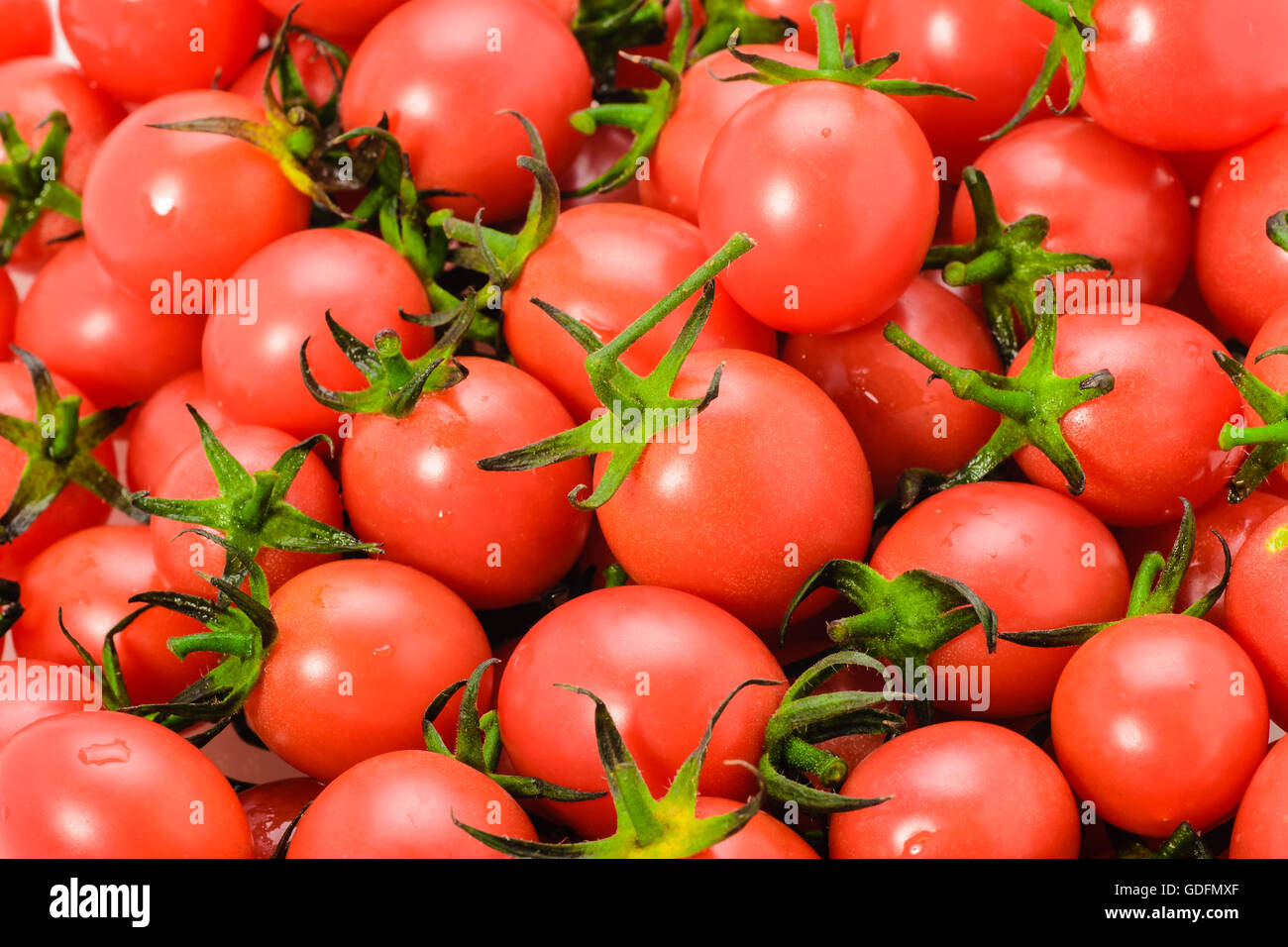 food background of fresh red cherry tomatoes Stock Photo - Alamy