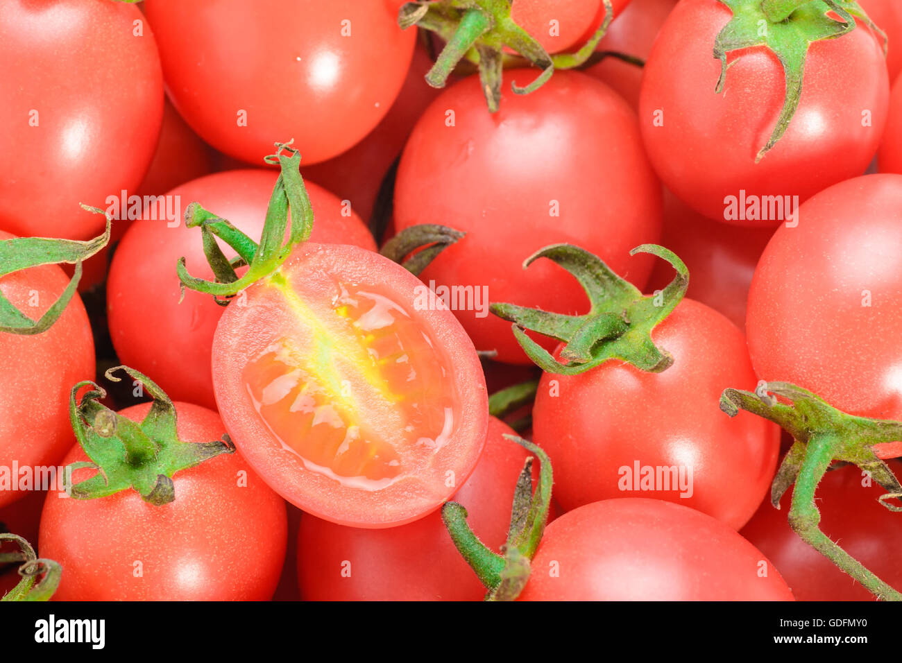 food background of fresh red cherry tomatoes Stock Photo - Alamy