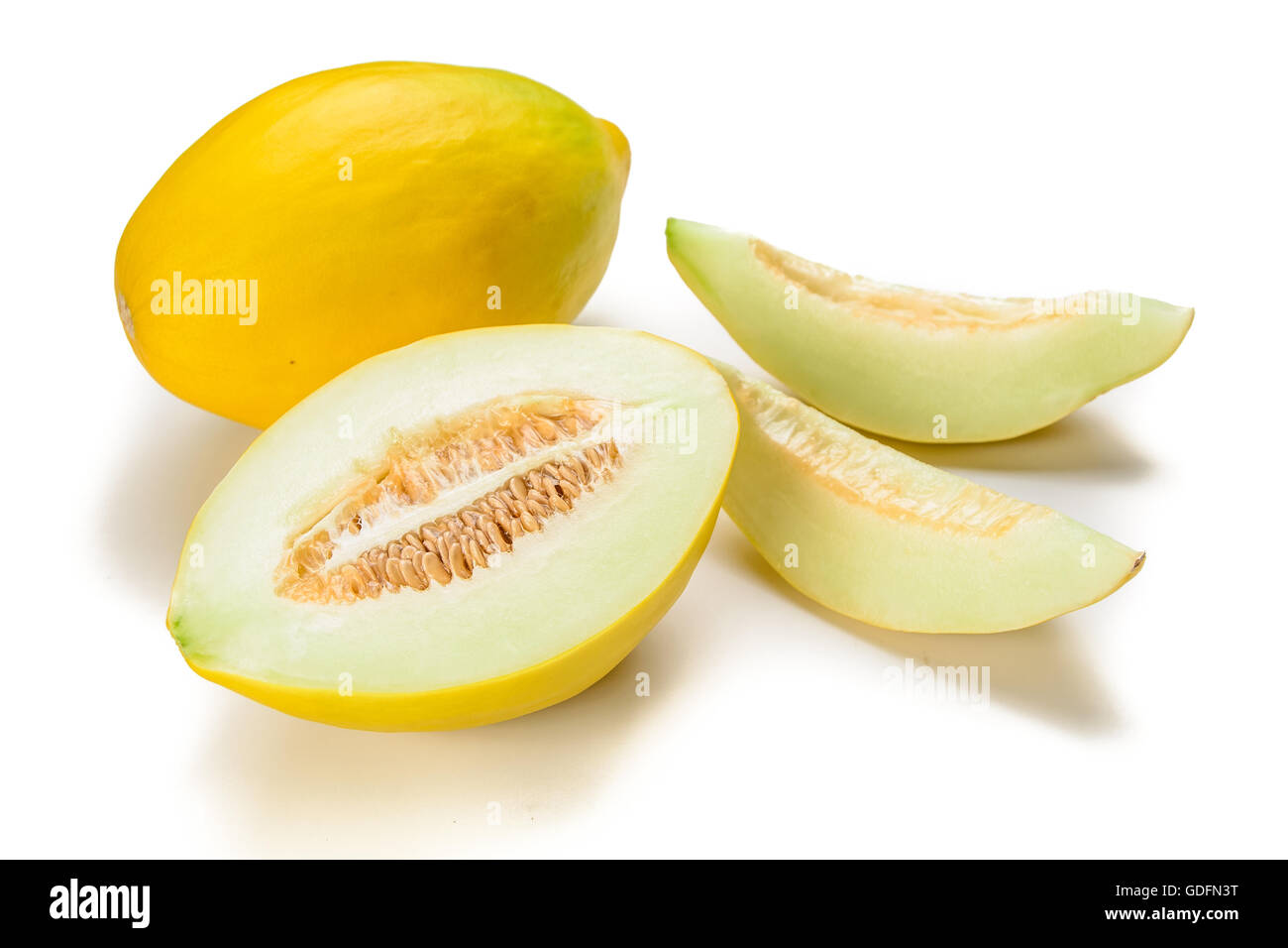 yellow melon slices on the white background Stock Photo - Alamy