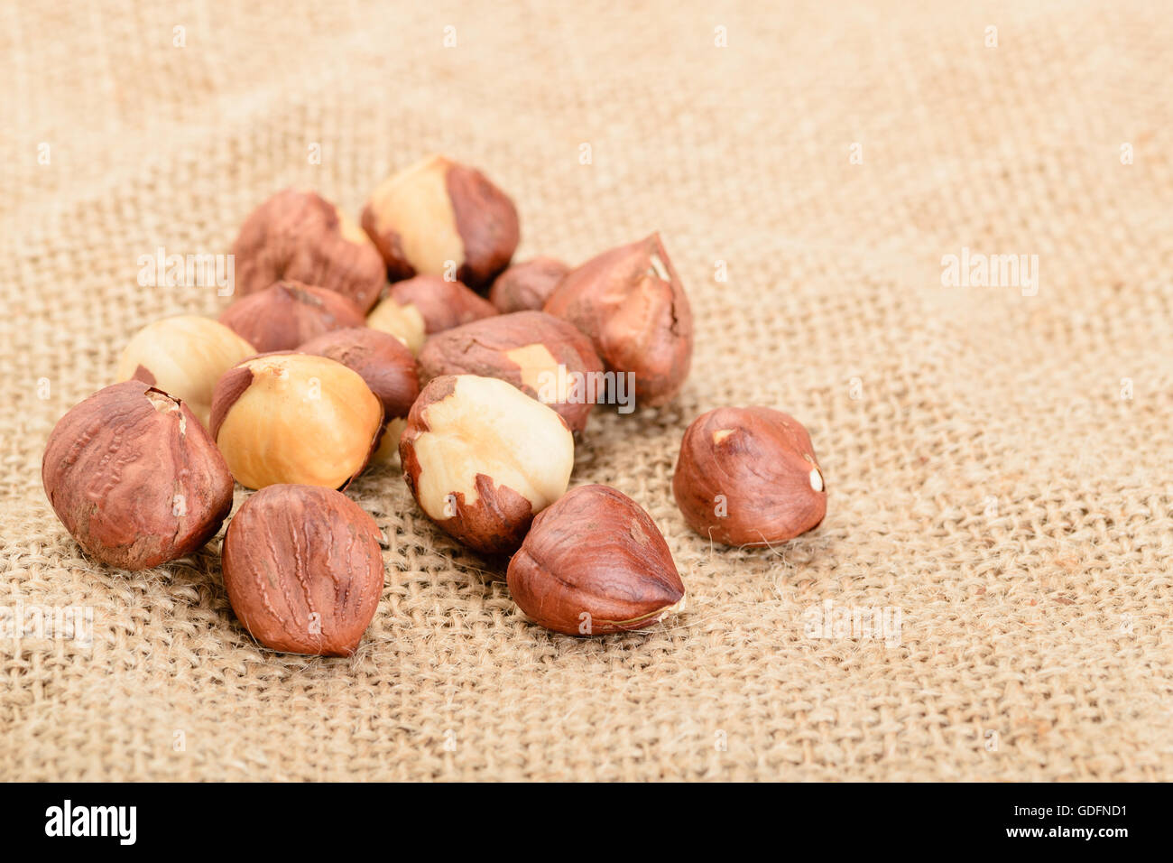 dried hazelnut on the linen background Stock Photo - Alamy