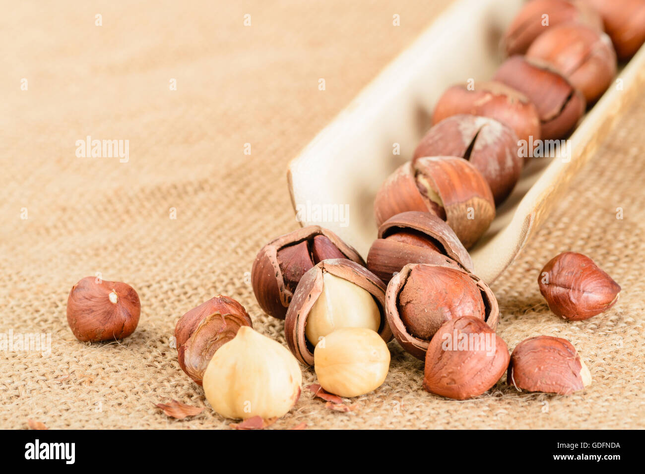 dried hazelnut in the bamboo plate Stock Photo - Alamy