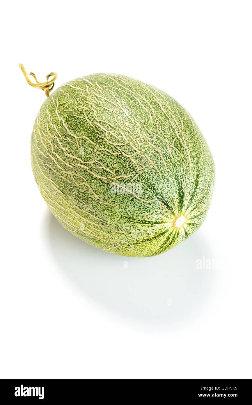 green netted melon on the white background Stock Photo - Alamy